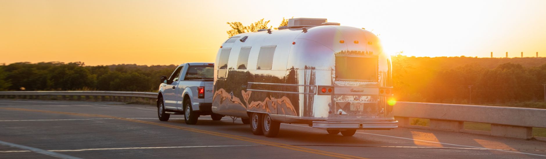 TFCU_Promo_219_Airstream_Trailer_Highway_Wide | Tinker Federal Credit Union